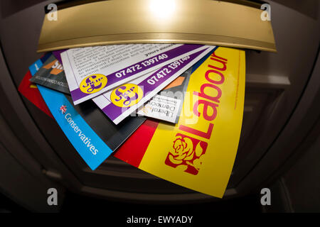 Leaflets through letterbox Stock Photo - Alamy