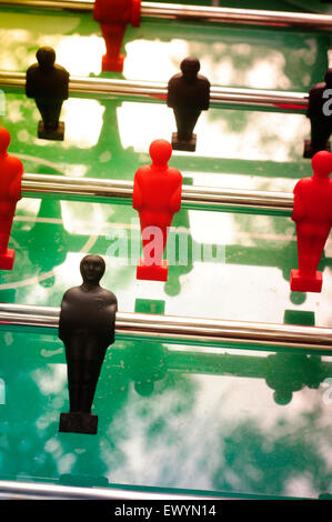 table football game of football metallic figures on the field, foosball ...