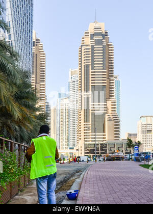 Migrant worker in Dubai Stock Photo - Alamy