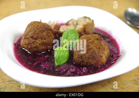 cabbage soup witch meat chop on white plate Stock Photo - Alamy