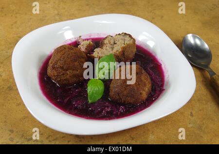 cabbage soup witch meat chop on white plate Stock Photo - Alamy