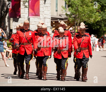 Royal Canadian Mounted Police officers in formal red serge uniforms ...
