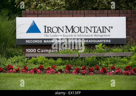 A logo sign outside the headquarters of the Iron Mountain Records ...