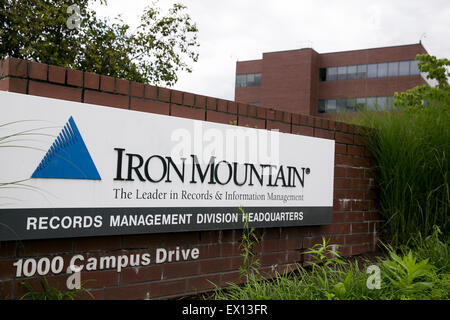 A logo sign outside the headquarters of the Iron Mountain Records ...