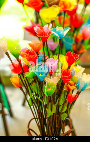 Colorful silk artificial flowers background Stock Photo - Alamy