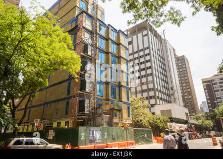 Construction on nARCHITECTS micro-unit modular apartments, branded ...