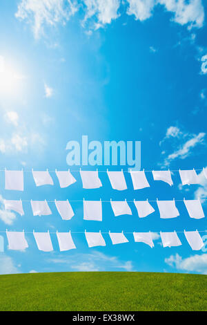 Clean towel hanging on a drying rack in a bathroom. The image ...