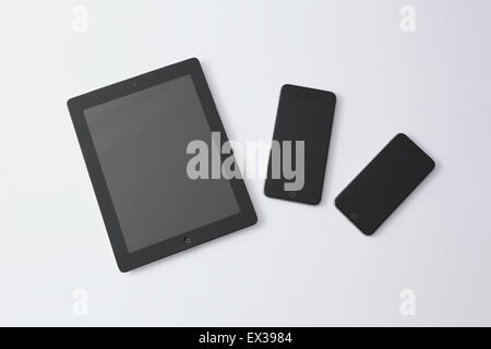 business people with tablet pc and smartphones Stock Photo - Alamy