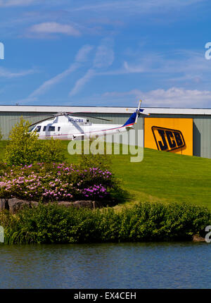 Private helicopter outside JCB World Headquarters in Rocester ...