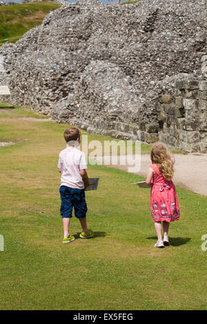 Visitors exploring Iron Age hill fort hillfort at Old Sarum, near ...