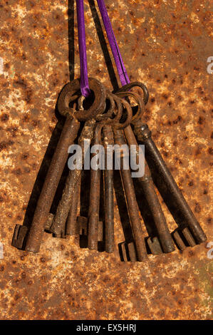 Old keys on a rusty surface Stock Photo - Alamy