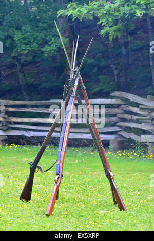 Muskets with bayonets stacked together in Union camp. Historical ...