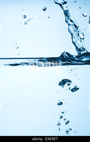 A vertical shot of water splash background Stock Photo - Alamy