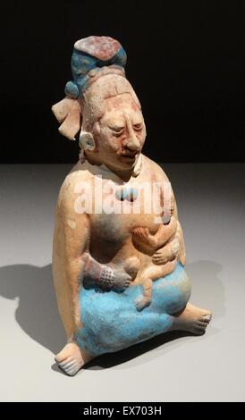 Mayan ceramic figurine of a noblewoman with a small child, from Jaina ...