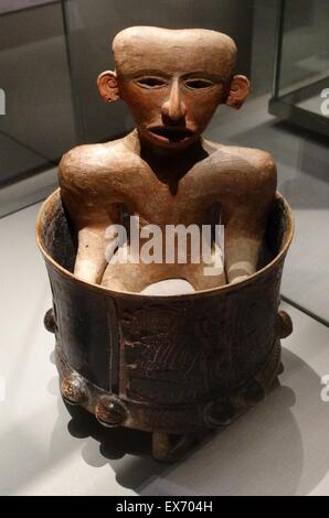 Mayan ceramic tripod vase with seated figure inside; ; Classical period ...