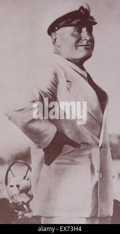 Benito Mussolini the Italian fascist leader in an open top car with his ...