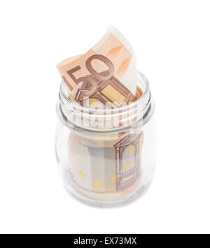 Multiple bank notes in a jar Stock Photo - Alamy