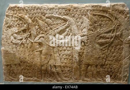 ASSYRIAN SOLDIERS IN BATTLE; ARCHERS PROTECTED BY LARGE REED-MATE ...