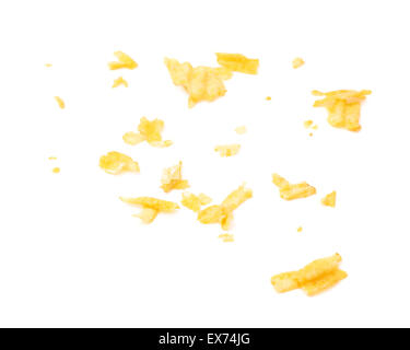 Potato chips crumbs and leftovers isolated over the white background ...