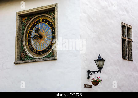 Clock at the Church of the Holy Ghost in Tallinn, Estonia Stock Photo ...