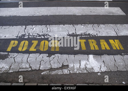 Road with tarmac, painted crossing, tram tracks, manhole cover Stock ...