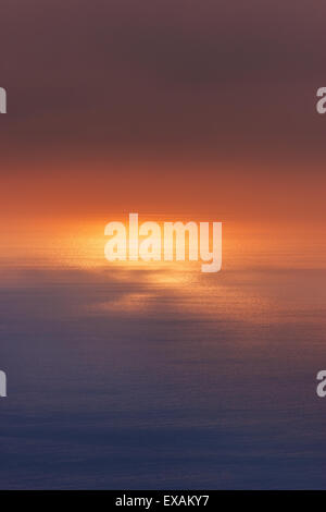 Sunset over the sea. Reflection of sunlight in the sea waves. Red sky ...