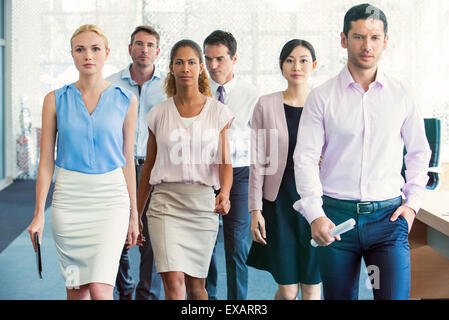 Officer workers marching in unison Stock Photo - Alamy