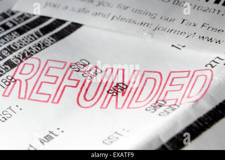 Red stamp REFUNDED on Duty Free shopping receipt Stock Photo - Alamy