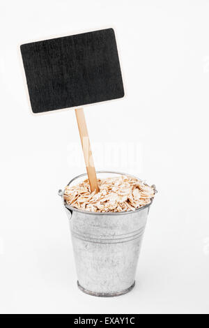 Pointer, price in bucket of oat flakes, on a white background Stock ...