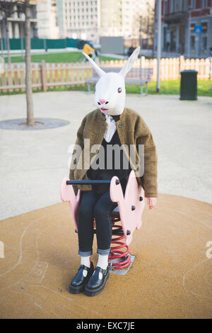 Caucasian woman wearing a carnival mask Stock Photo - Alamy