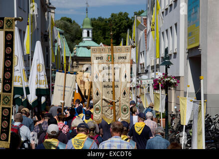 Telgte, Germany. 11th July, 2015. Pilgrims walk across a street during ...