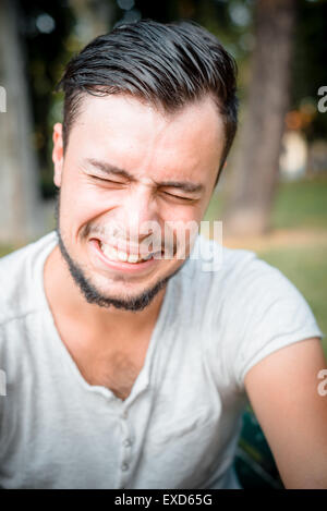 Close Up of a Crying Man portrait with Red eyes. emotional man isolated ...