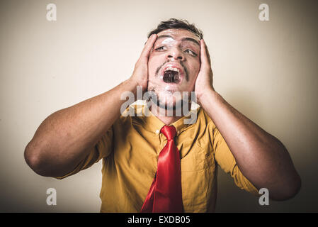 suffocating man with the plastic on white background Stock Photo ...