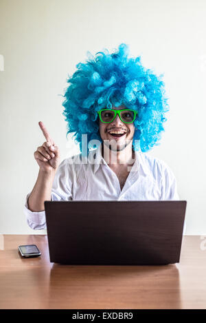 Funny and crazy man using a computer Stock Photo - Alamy