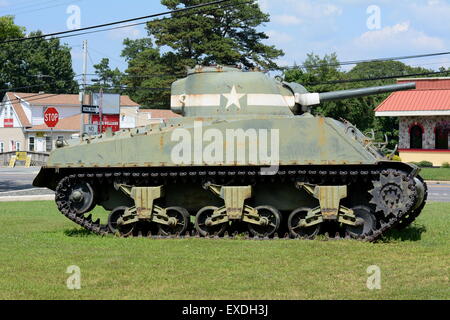 Militery tank on display for the public to see. A sign of the countries ...
