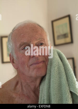 Man drying face with towel Stock Photo: 7332967 - Alamy