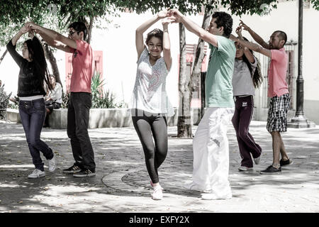 People dancing salsa outdoors in a bar late at night, Trinidad, Cuba ...