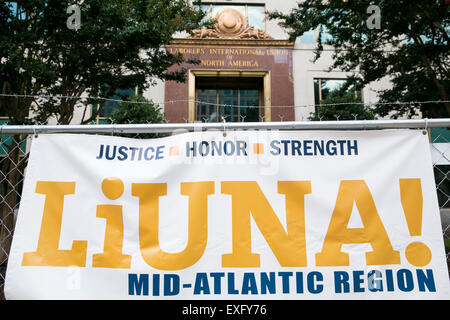 A logo sign outside of the headquarters of the Laborers' International ...