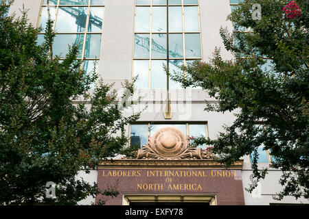 A logo sign outside of the headquarters of the Laborers' International ...