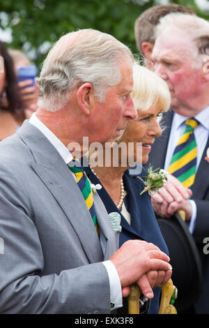The Prince of Wales and the Duchess of Cornwall talk to staff in Chris ...