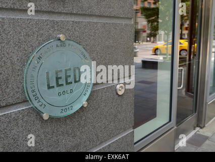 LEED gold rating sign for environmental efficiency on apartment ...