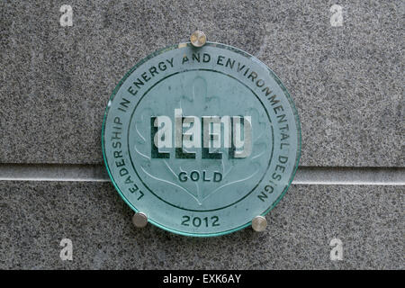 LEED gold rating sign for environmental efficiency on apartment ...