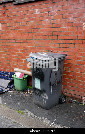 Overloaded trash bin in a street in the dutch city Haarlem Stock Photo ...