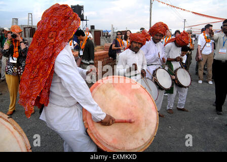 Dancers perform the traditional Marathi folk dance welcome former ...