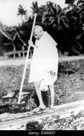 Mahatma Gandhi walking with stick in Satyagraha Ashram, Segaon ...