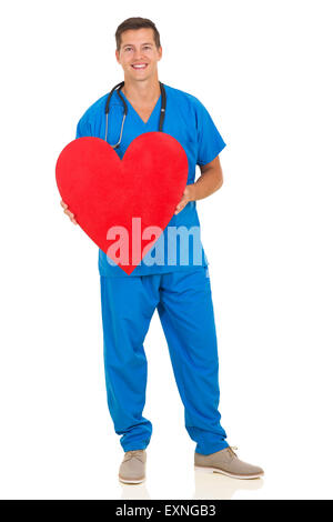 Young doctor with heart shape isolated on white Stock Photo - Alamy