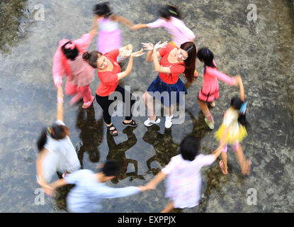 Loudi, China's Hunan Province. 16th July, 2015. Volunteers from ...