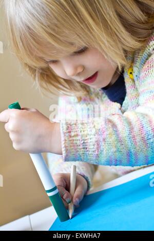Long haired blonde girl doing acrobatics in autumn park Stock Photo - Alamy