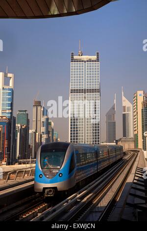 Vertical shot of the Dubai business center towers during a colorful ...