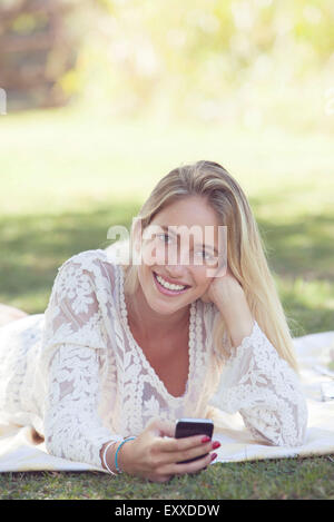 Lounging in the Park Stock Photo - Alamy
